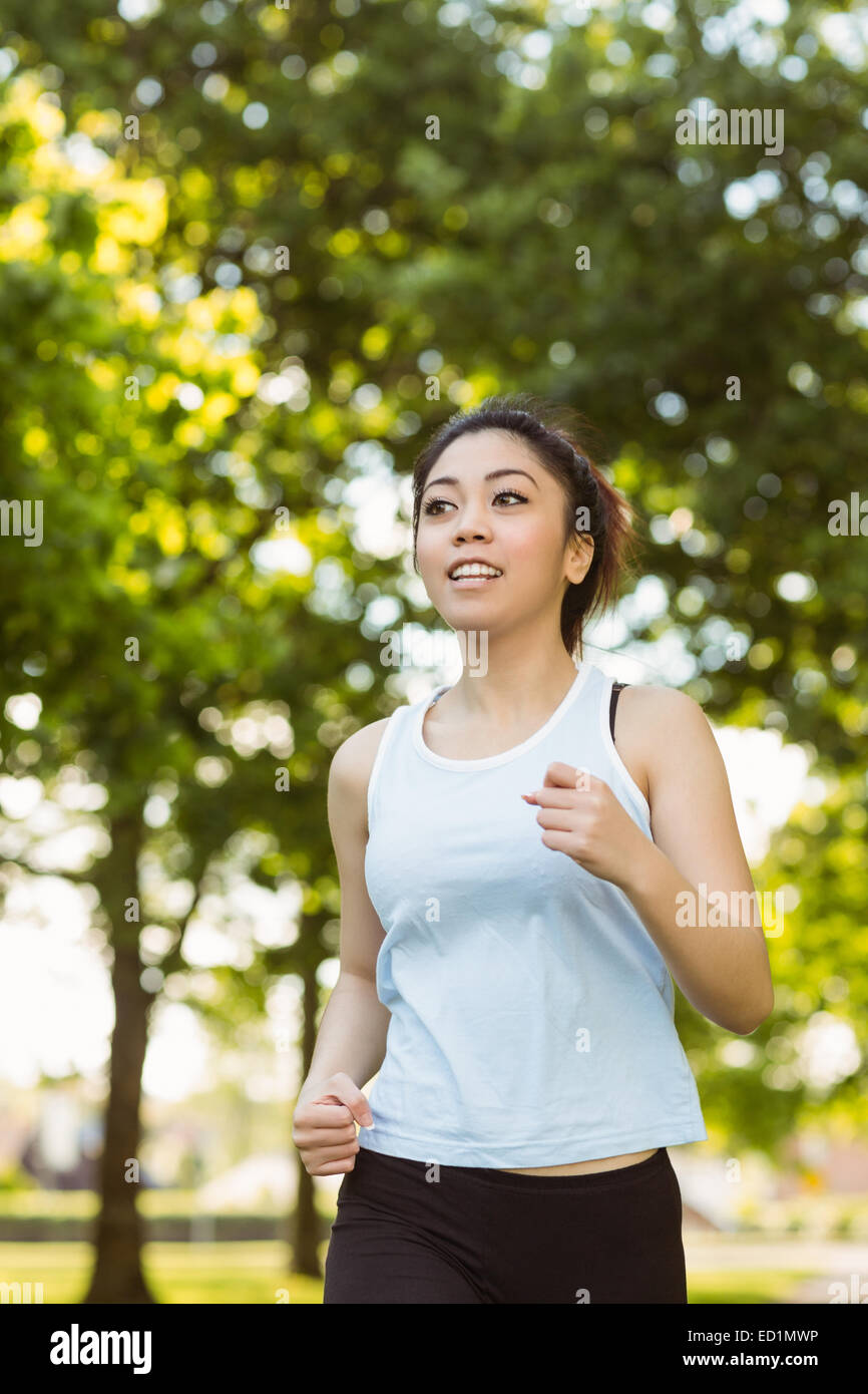 Woman jogging park hi-res stock photography and images - Alamy