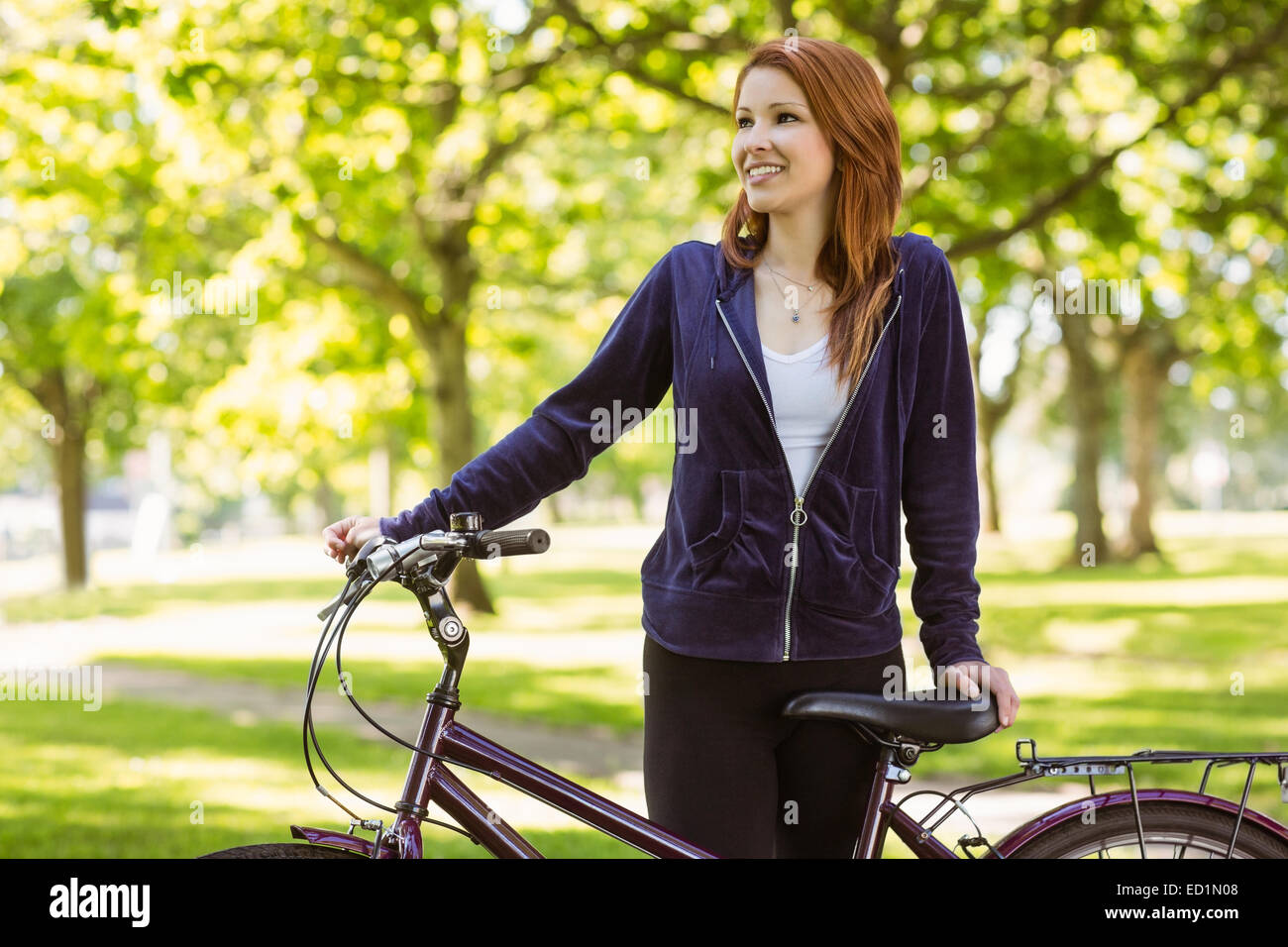 Woman redhead bike hi-res stock photography and images - Alamy