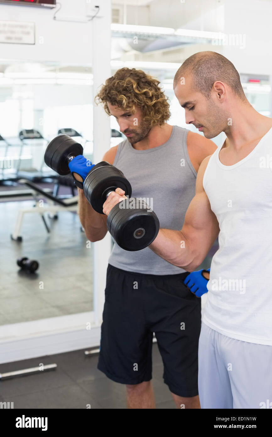 Young men exercising together in hi-res stock photography and images ...
