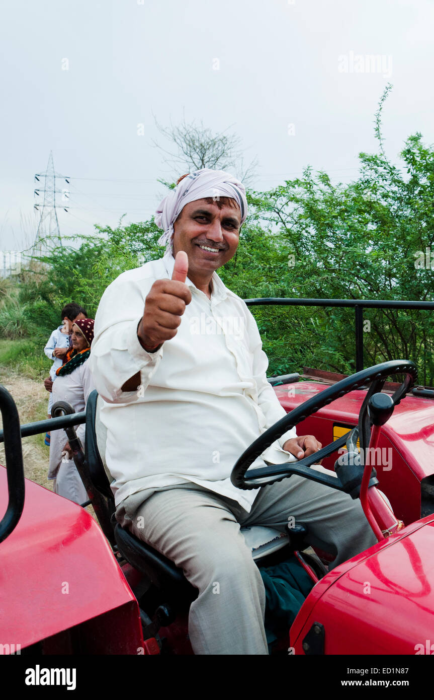 1 indian rural Farmer riding Tractor Stock Photo - Alamy