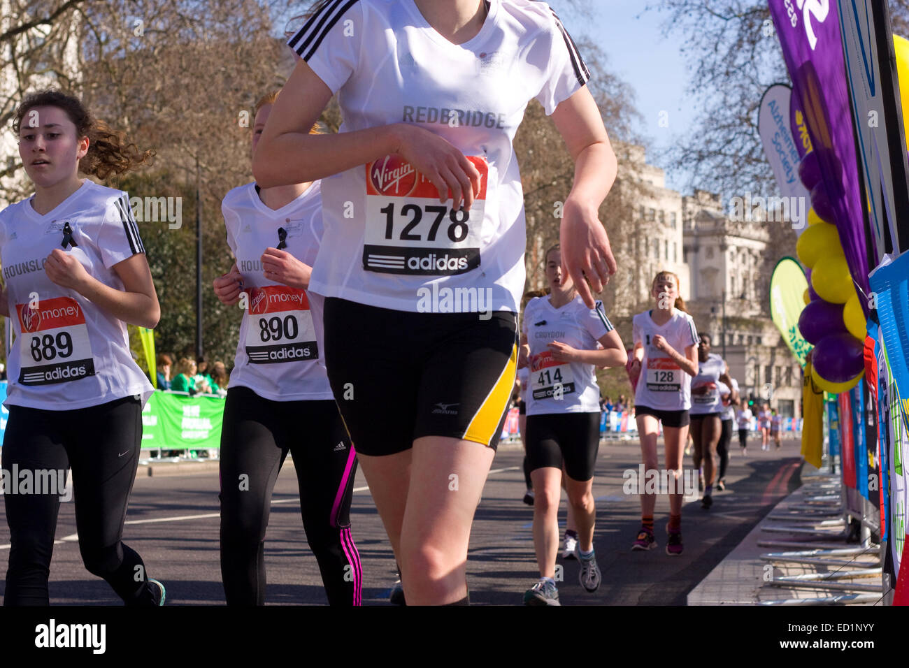 LONDON - APRIL 13: Unidentified girls run the London marathon on April ...