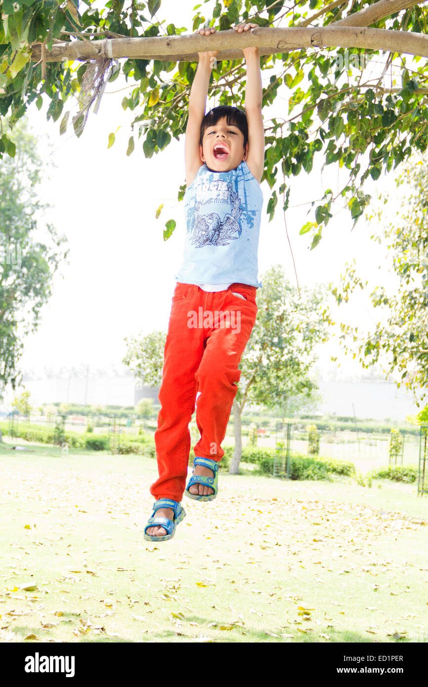 Kid swinging park india hi-res stock photography and images - Alamy