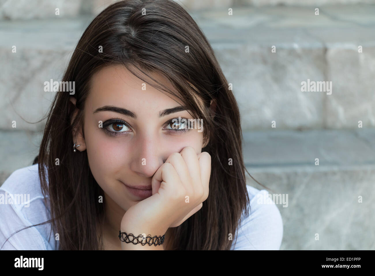 Girl looks in the eye in front of you Stock Photo - Alamy
