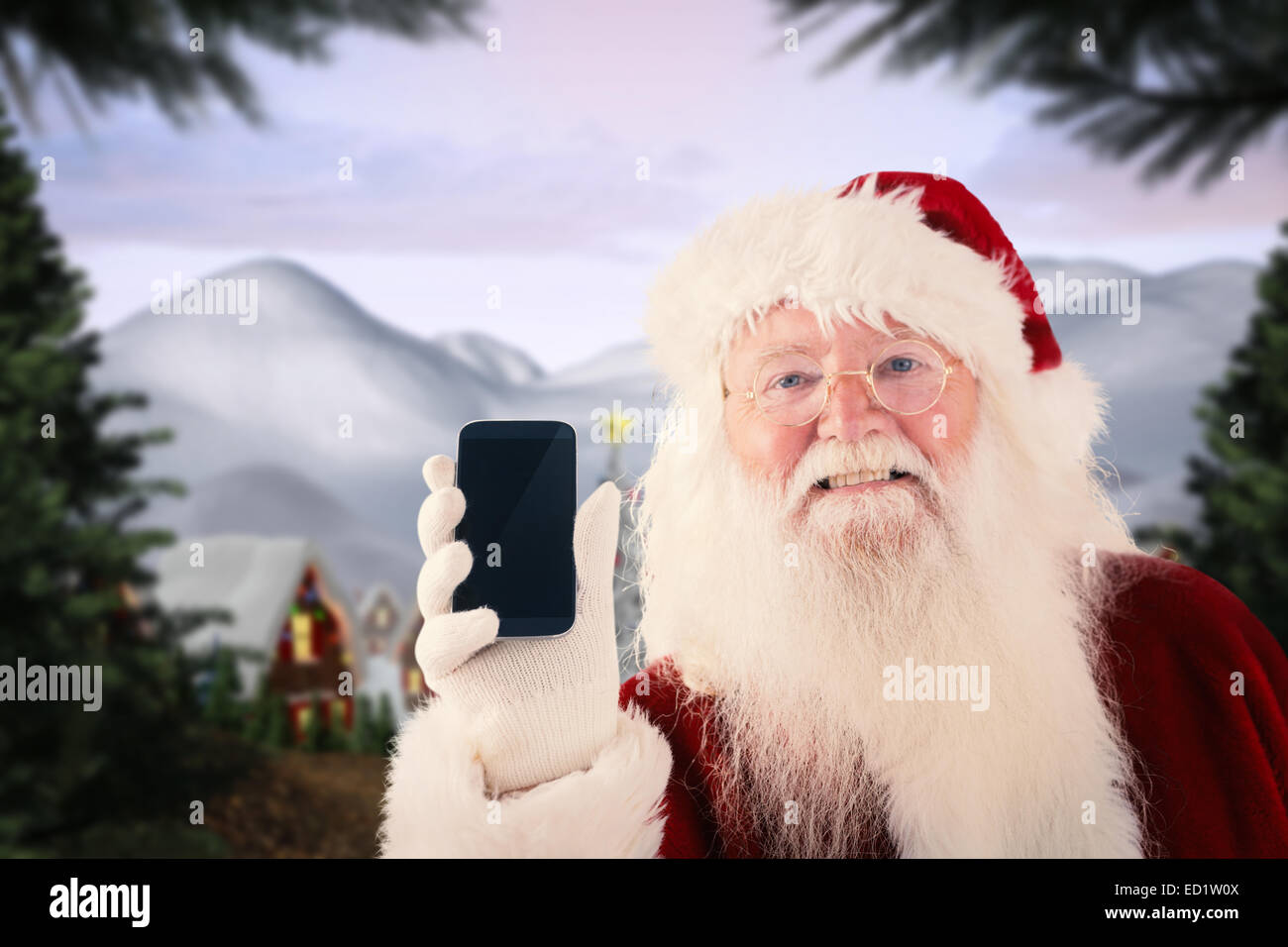 Composite image of santa claus shows a smartphone Stock Photo - Alamy