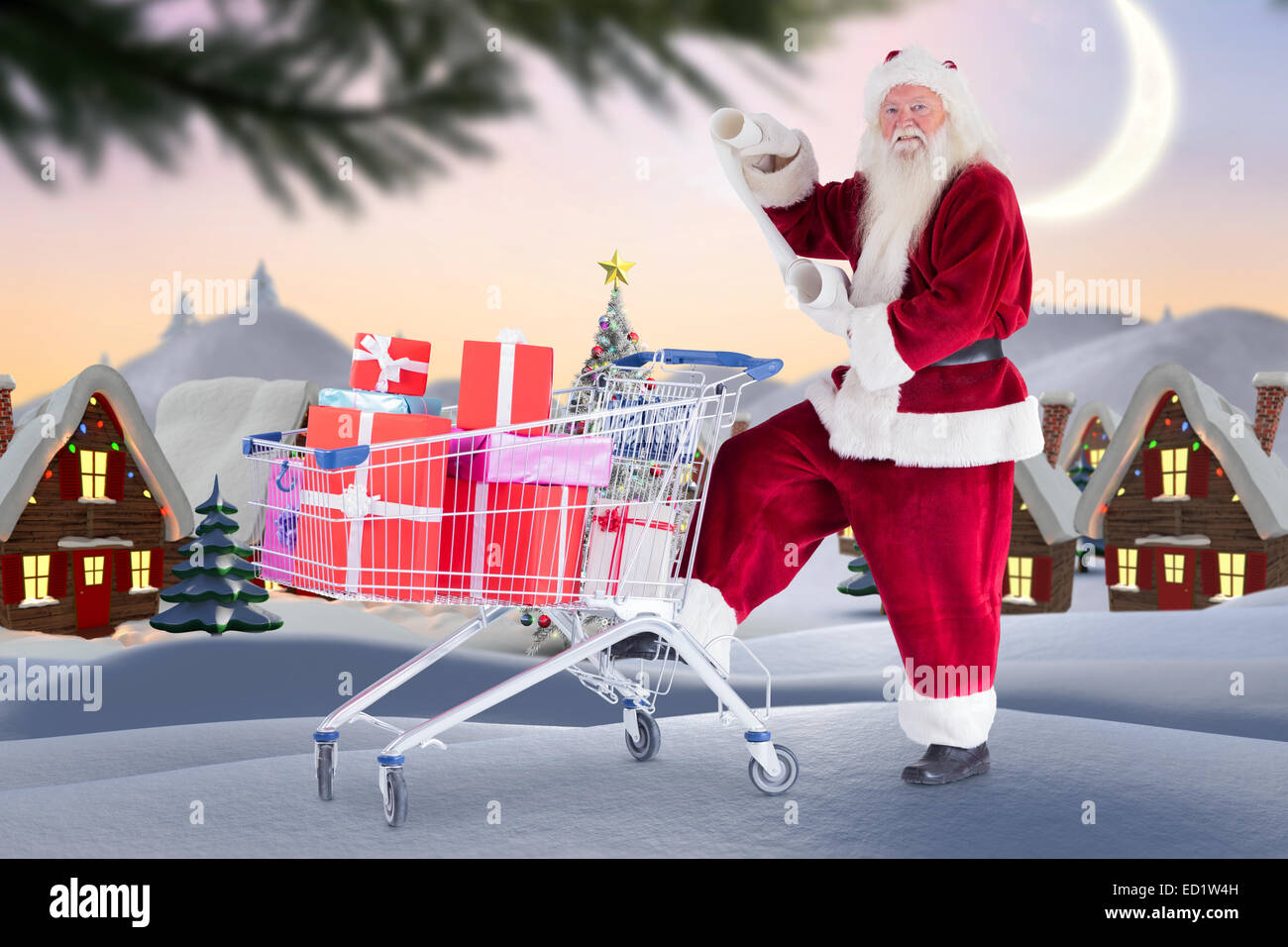 Composite image of santa delivering gifts from cart Stock Photo - Alamy