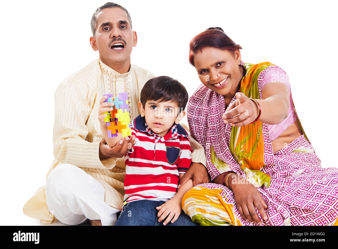 indian Parents and grandson playing toy Stock Photo - Alamy
