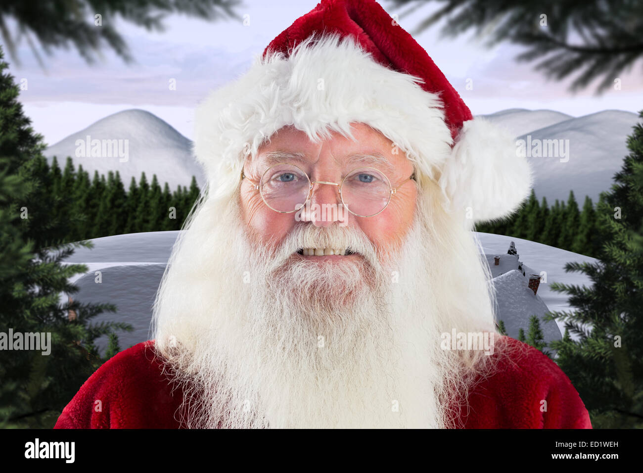 Composite image of santa smiles in the camera Stock Photo - Alamy