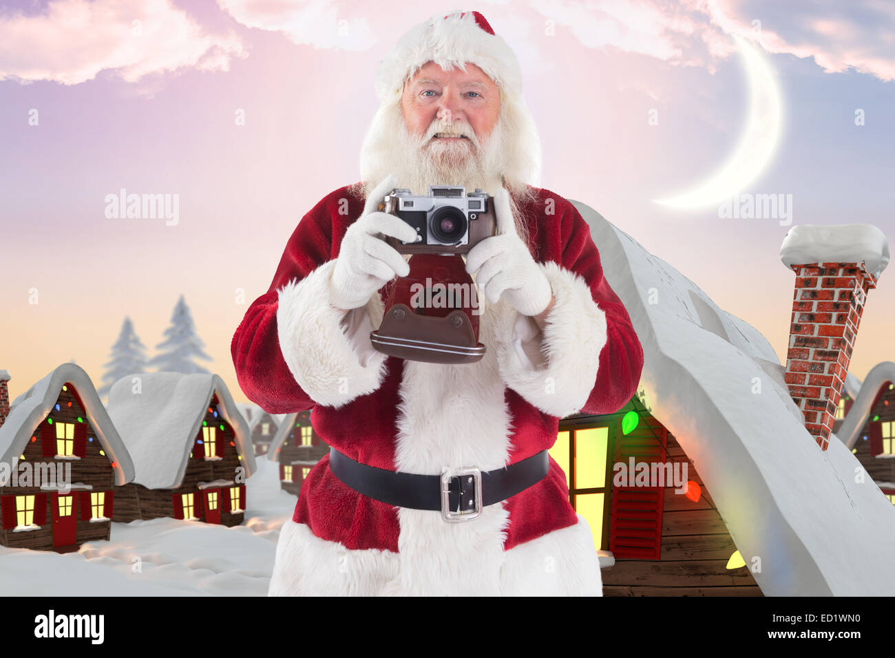 Composite image of santa is taking a picture Stock Photo - Alamy
