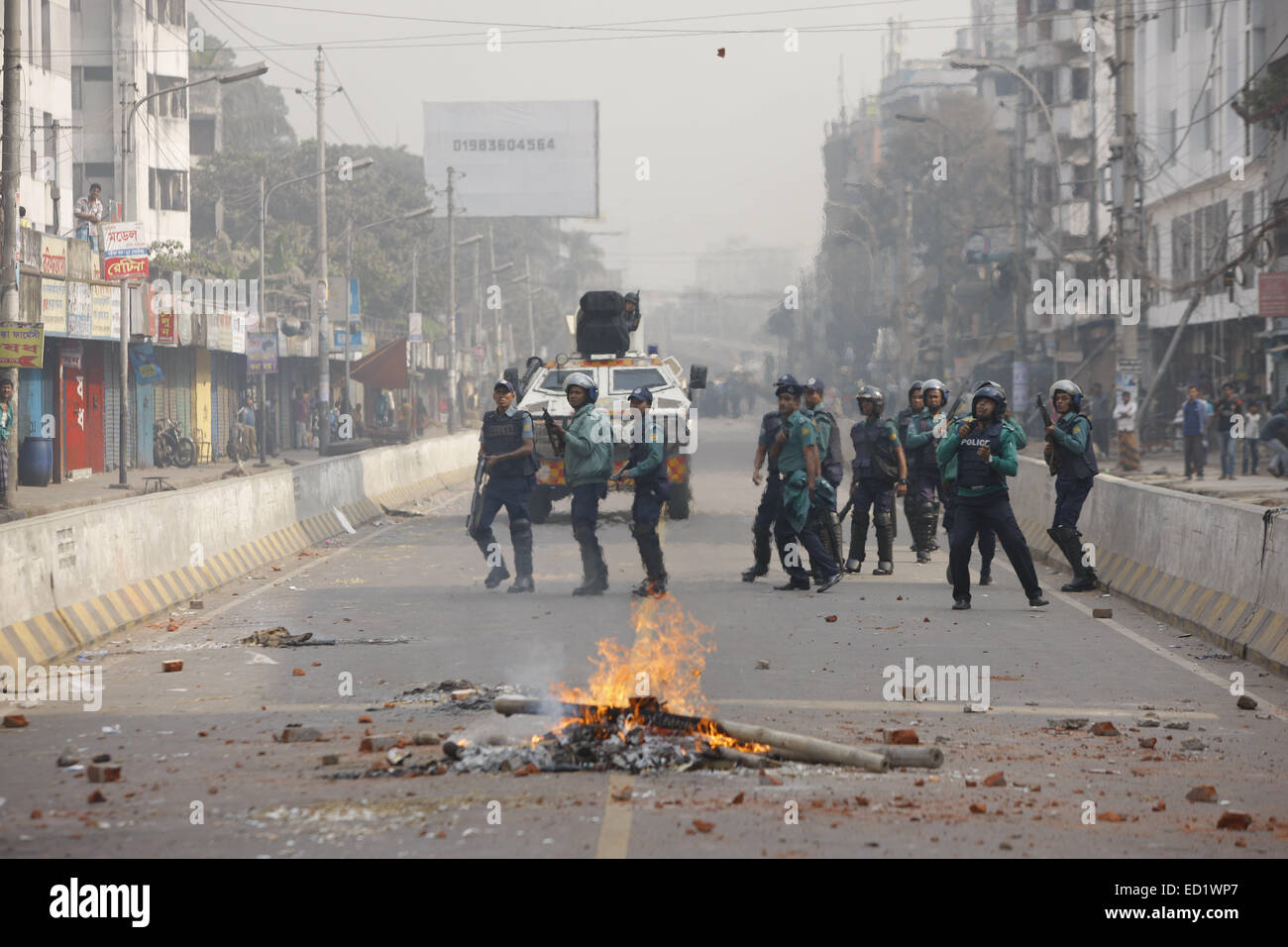 Dhaka, Bangladesh. 24th Dec, 2014. Police fires rubber bullet towards ...