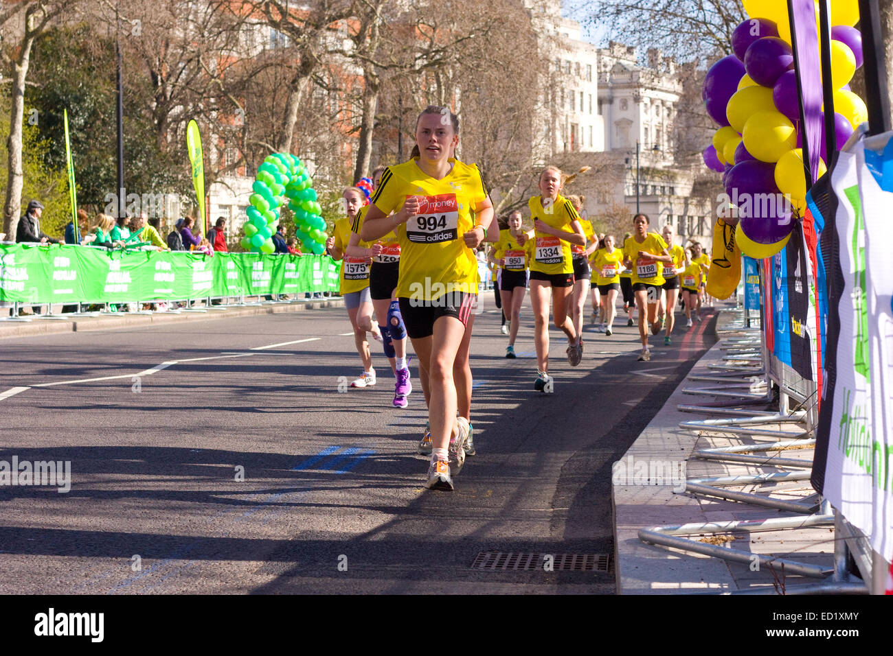 LONDON - APRIL 13: Unidentified girls run the London marathon on April ...