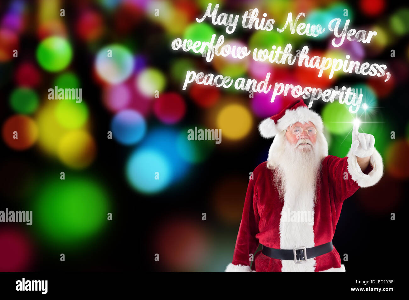 Composite image of santa claus points at something Stock Photo - Alamy