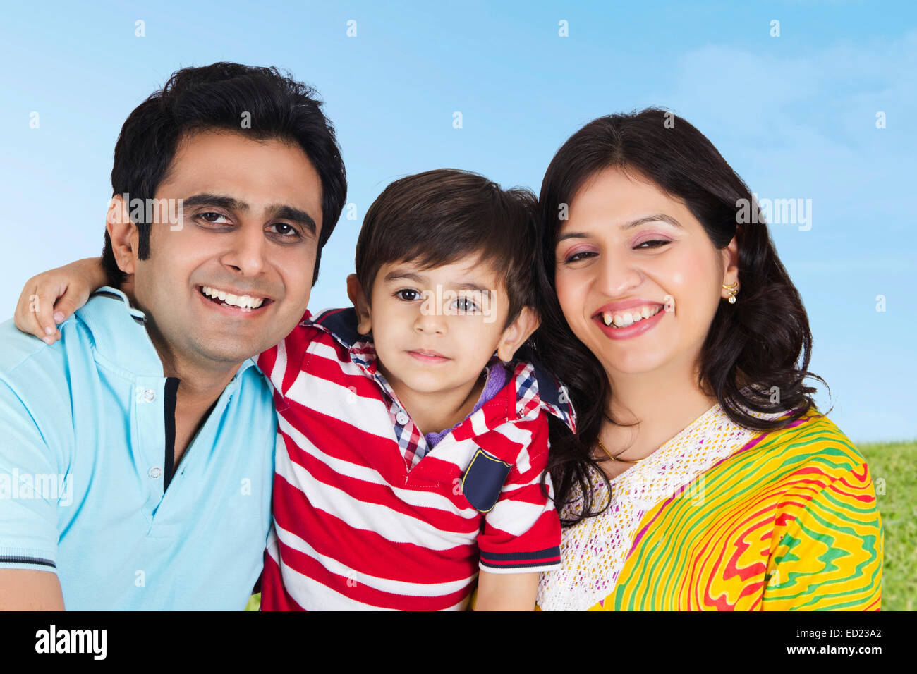 indian Parents with child care Stock Photo - Alamy