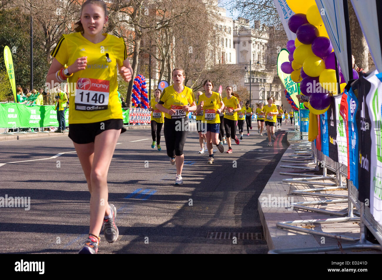LONDON - APRIL 13: Unidentified girls run the London marathon on April ...