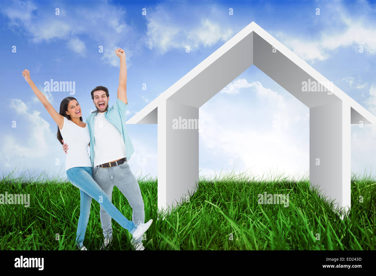 Composite image of happy casual couple cheering together Stock Photo ...
