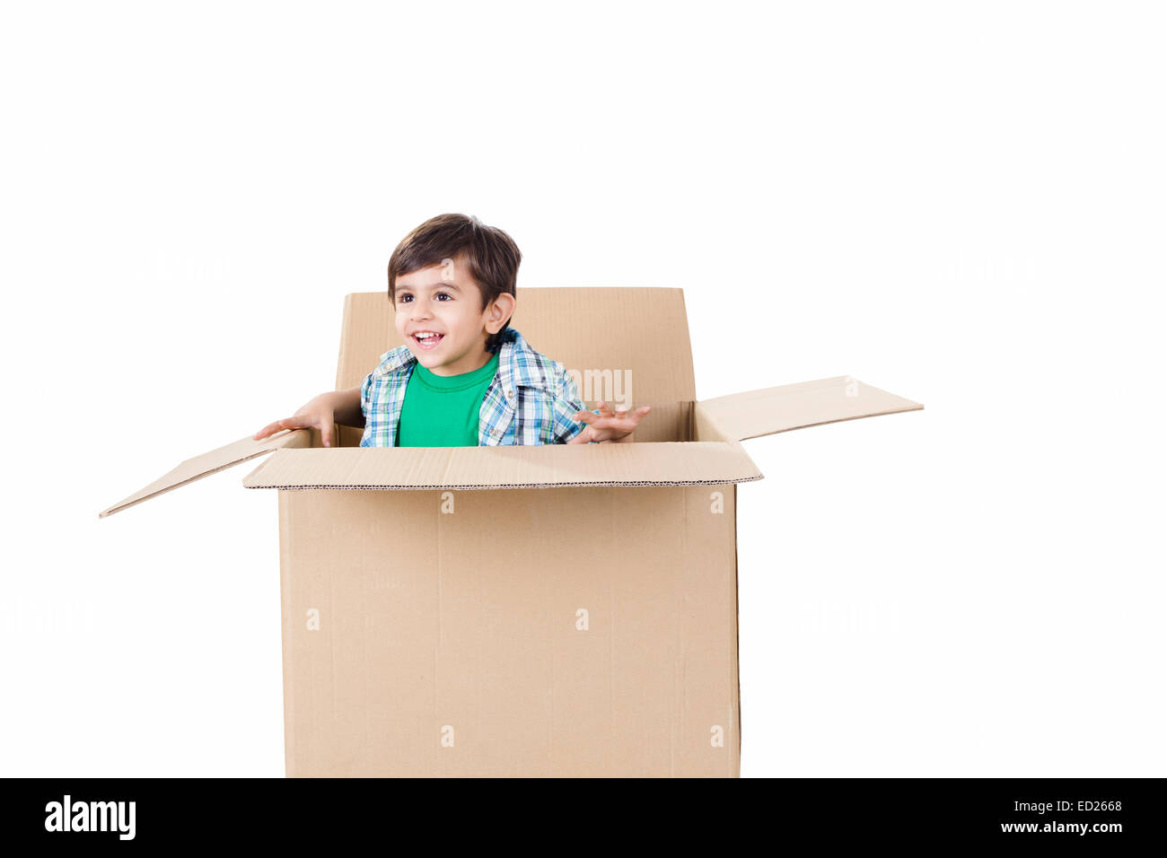 1 indian child boy playing Carton Box Stock Photo - Alamy