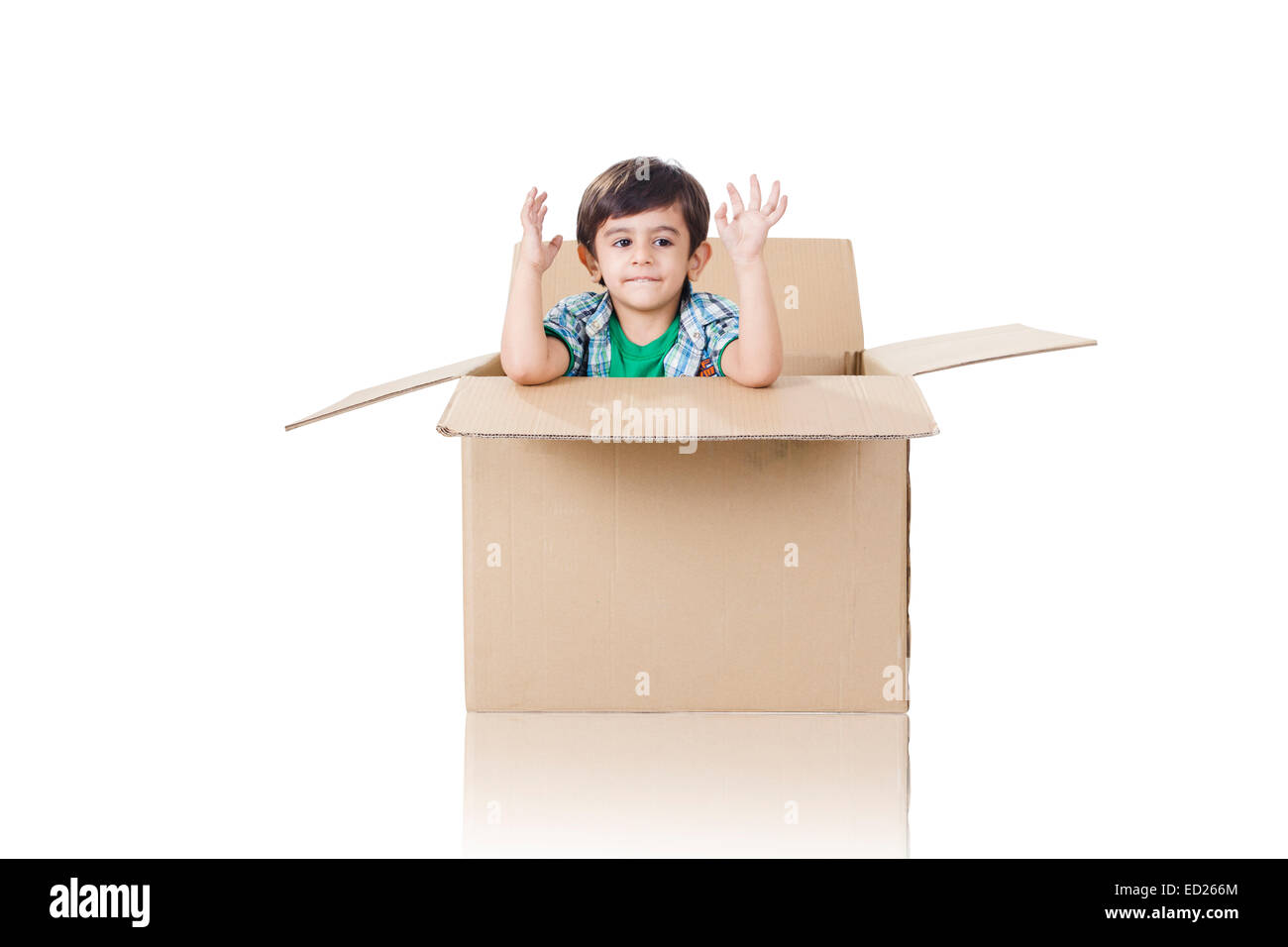 1 indian child boy playing Carton Box Stock Photo - Alamy