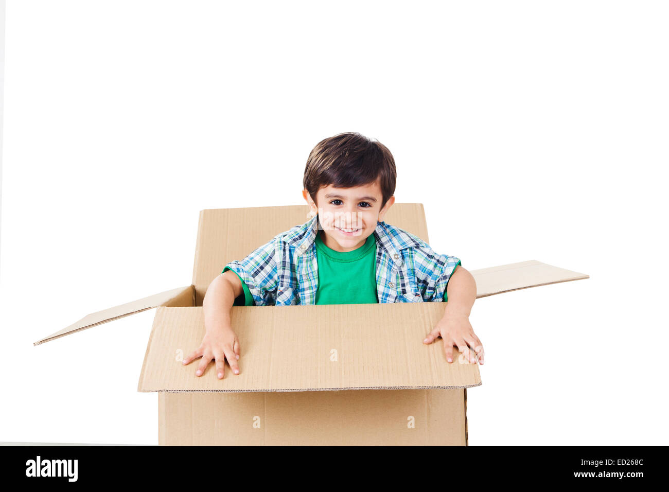 1 indian child boy playing Carton Box Stock Photo - Alamy