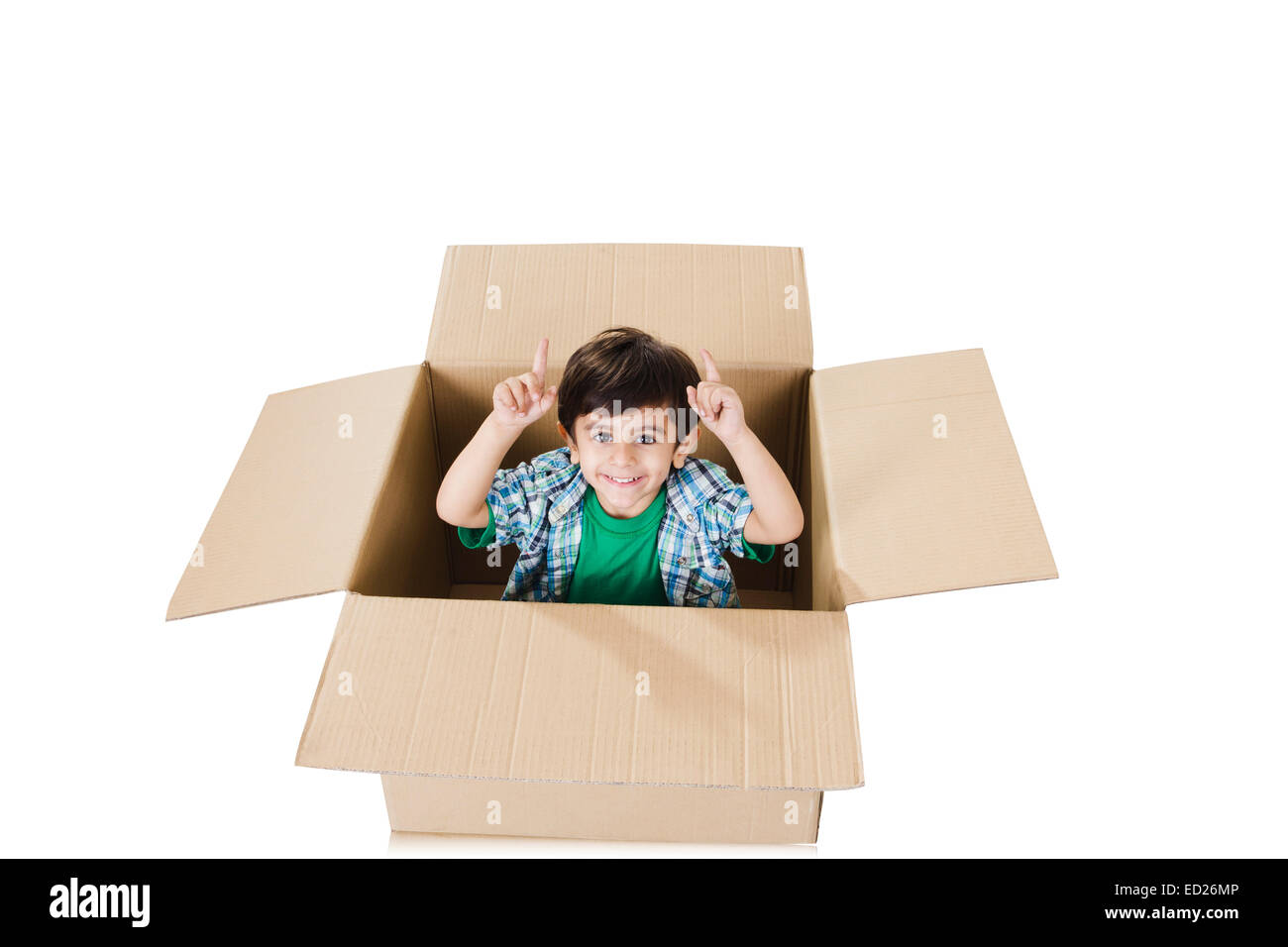 1 indian child boy playing Carton Box Stock Photo - Alamy