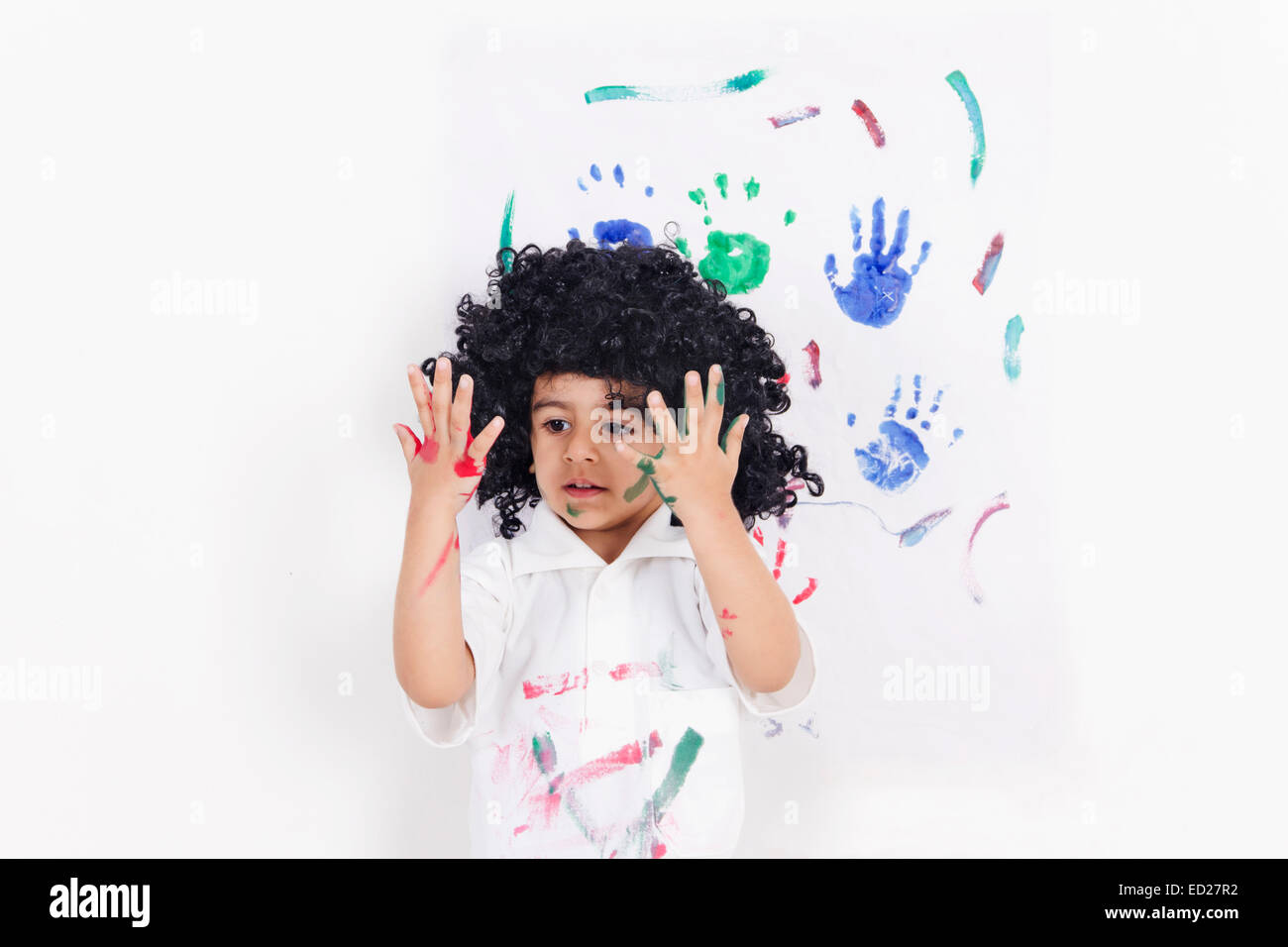 Children painting on wall school hi-res stock photography and images ...