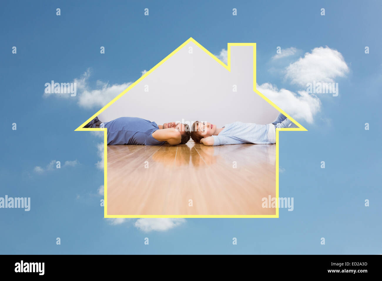 Composite image of couple lying on the floor Stock Photo - Alamy