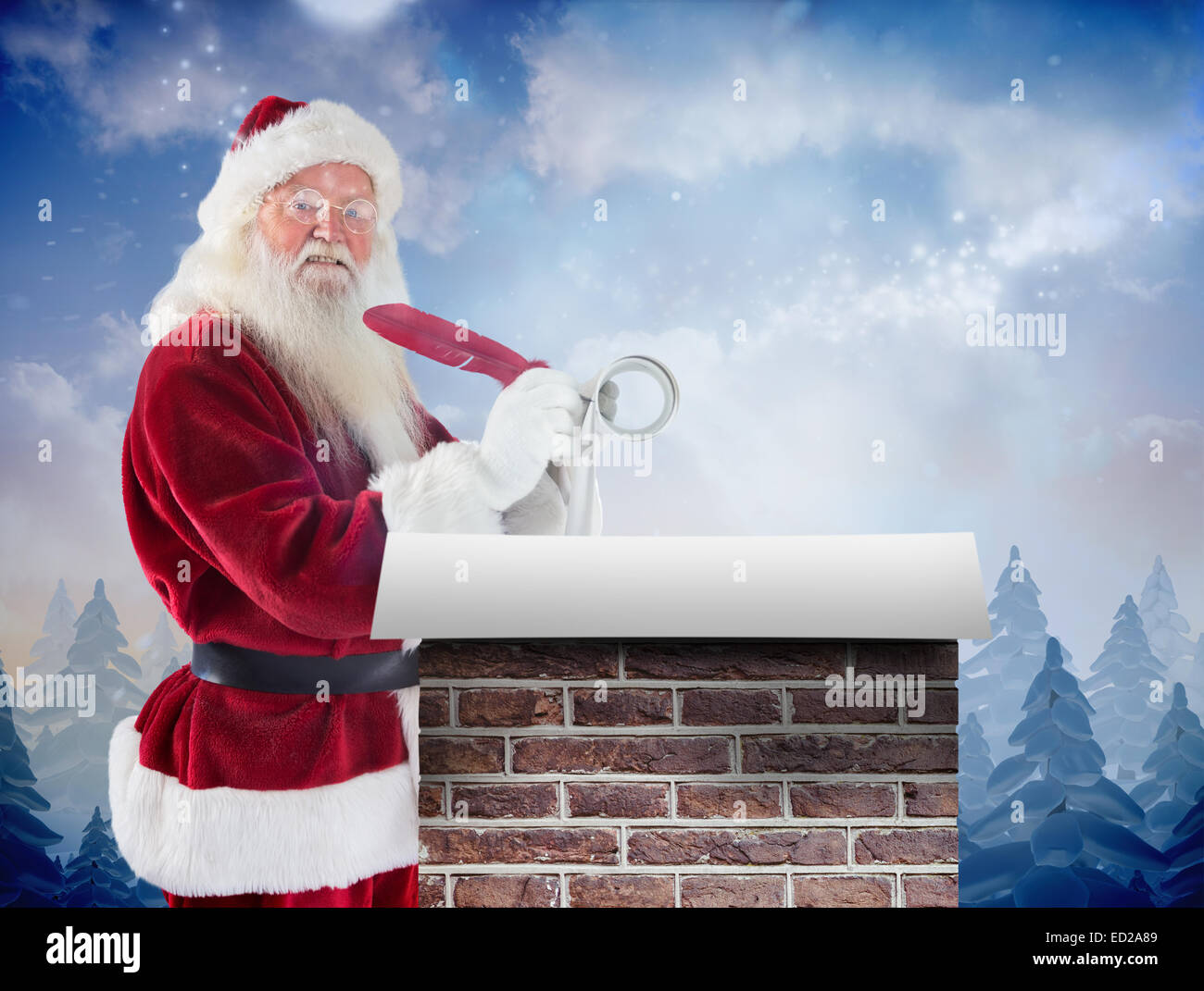 Composite image of santa writing his list Stock Photo - Alamy