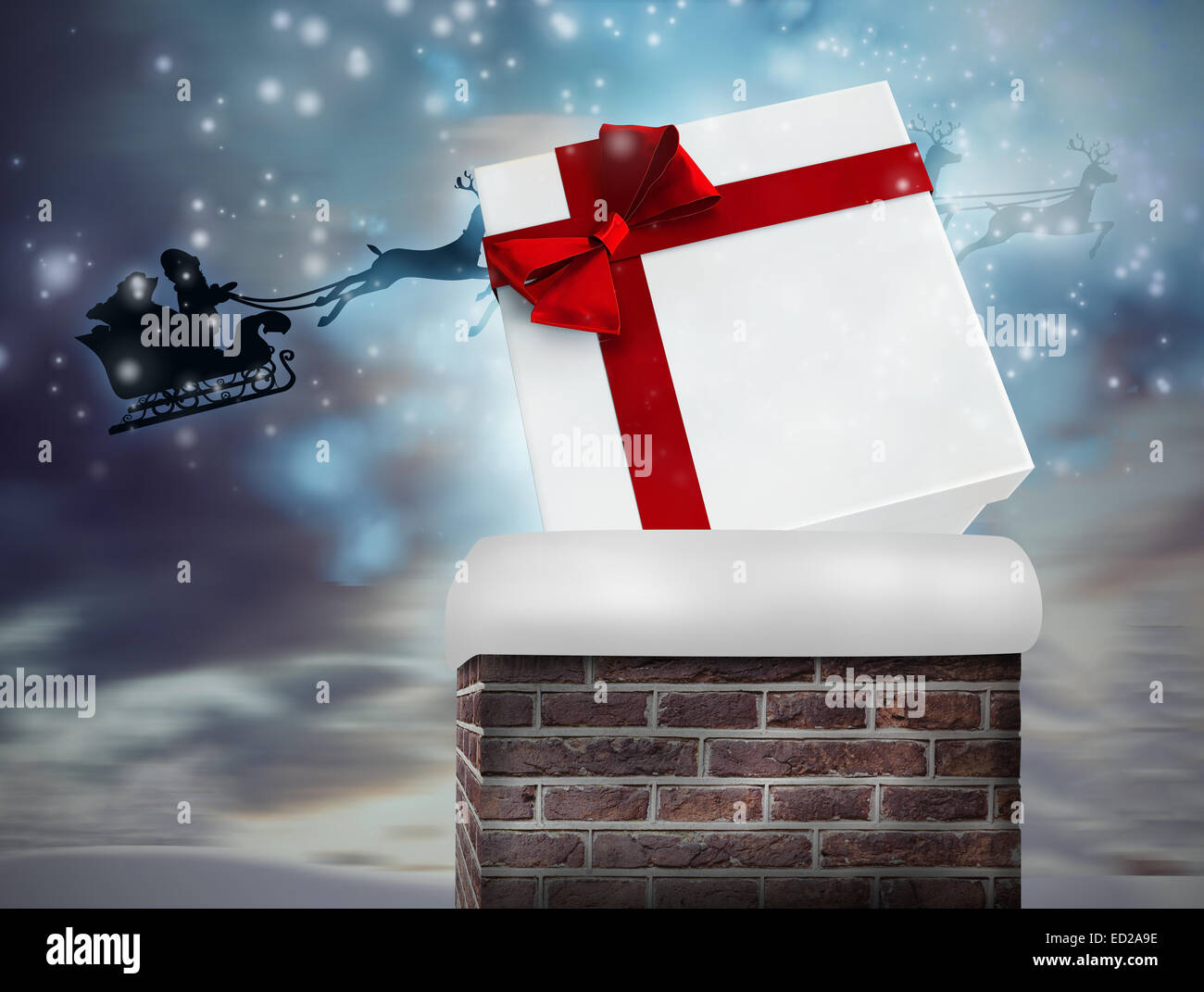 Composite image of santa flying his sleigh Stock Photo - Alamy