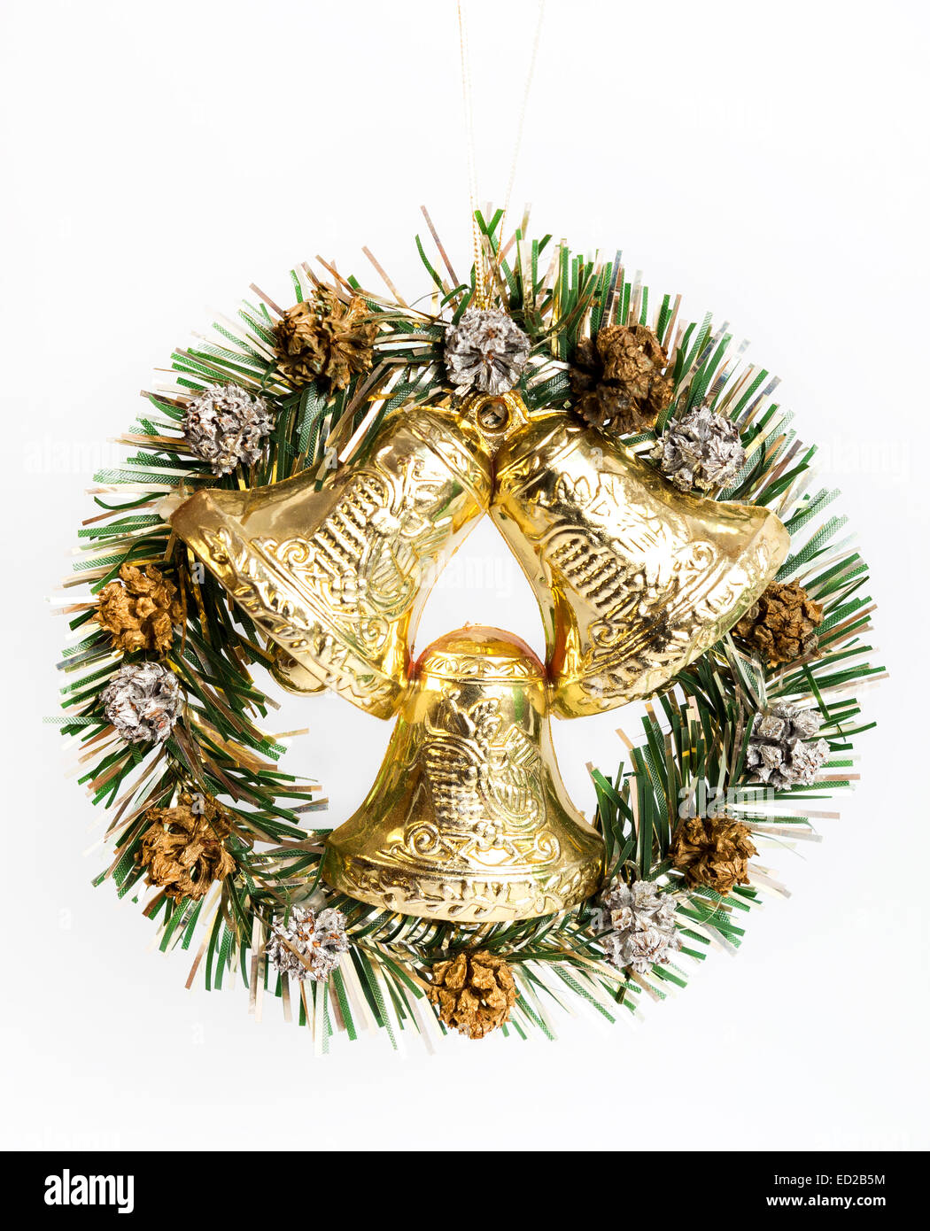 Three Christmas bells on a wreath isolated on white Stock Photo - Alamy