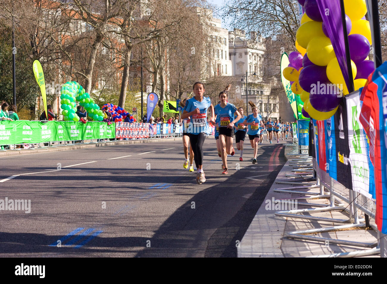 LONDON - APRIL 13: Unidentified girls run the London marathon on April ...
