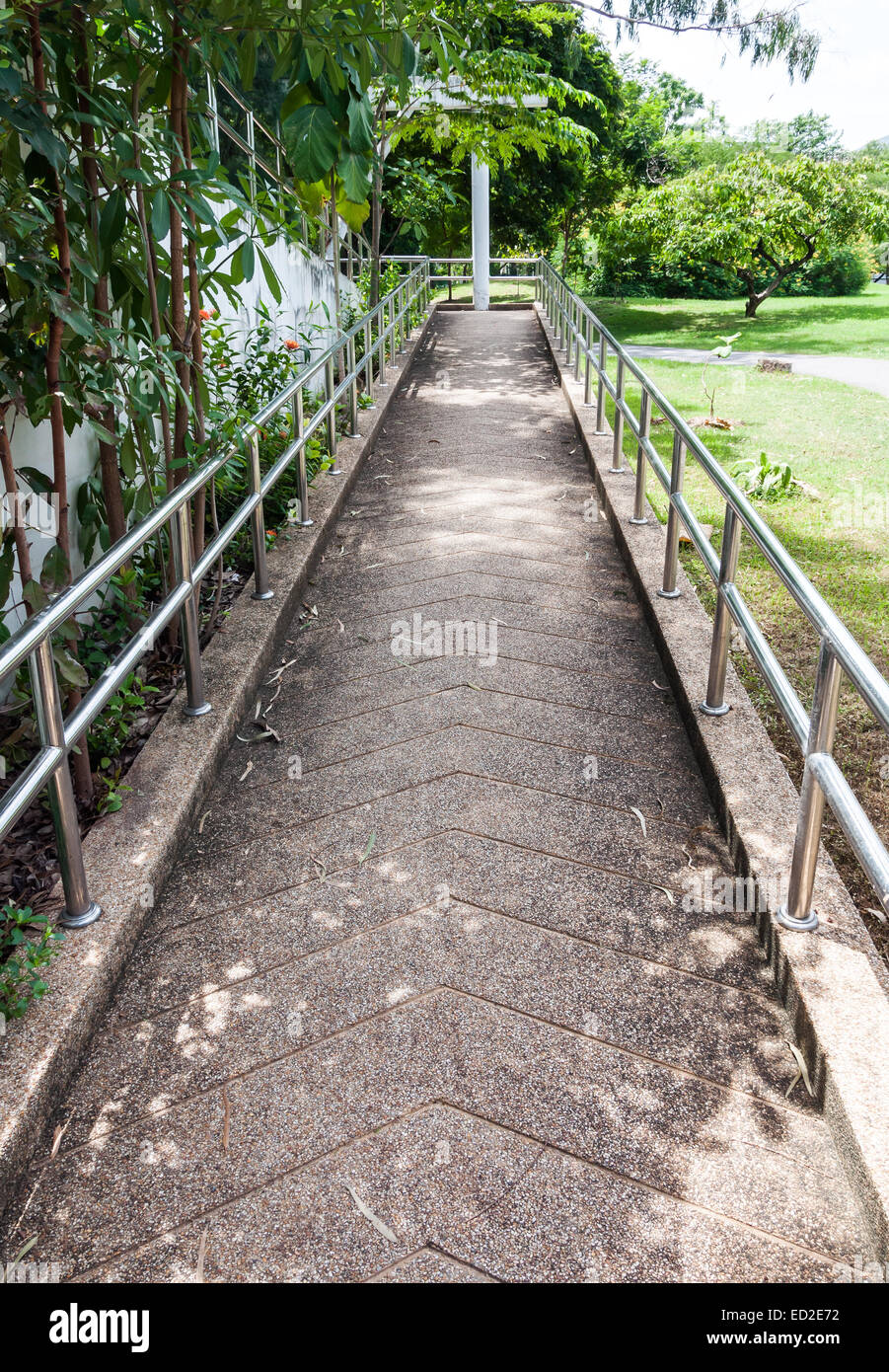 Bicycle ramp to the bridge of urban park Stock Photo - Alamy