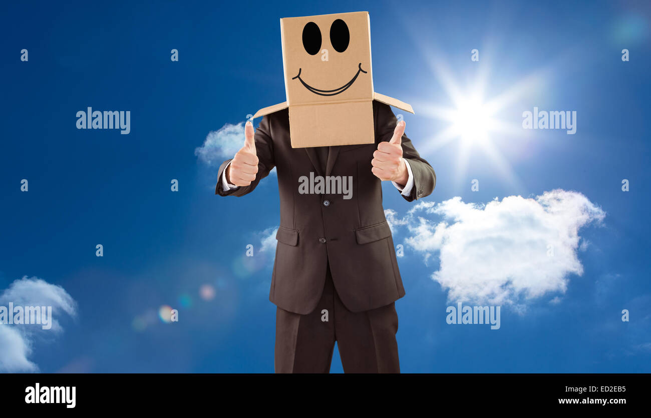 Composite image of anonymous businessman with thumbs up Stock Photo - Alamy