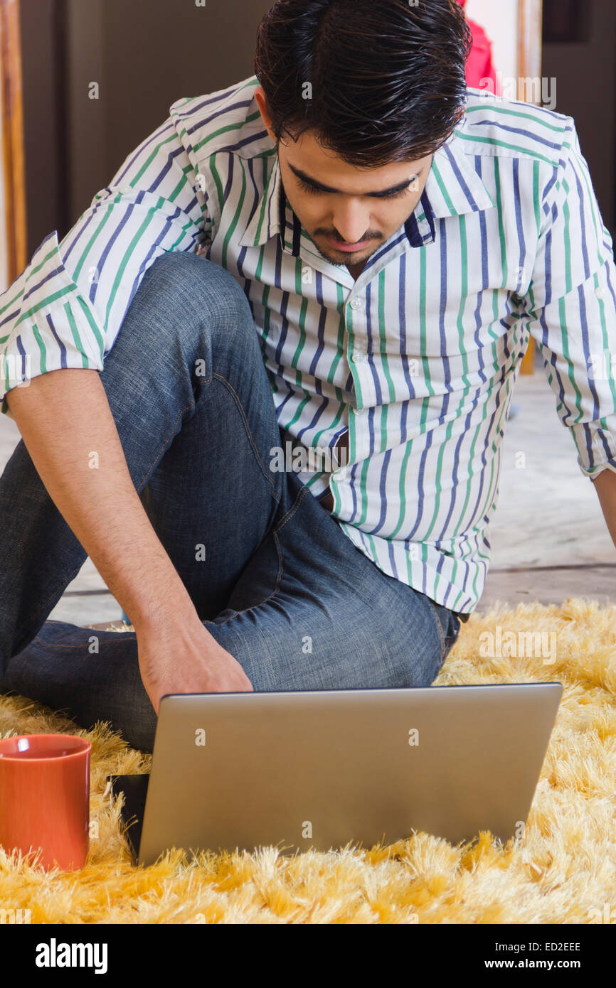1 indian man home laptop working Stock Photo - Alamy