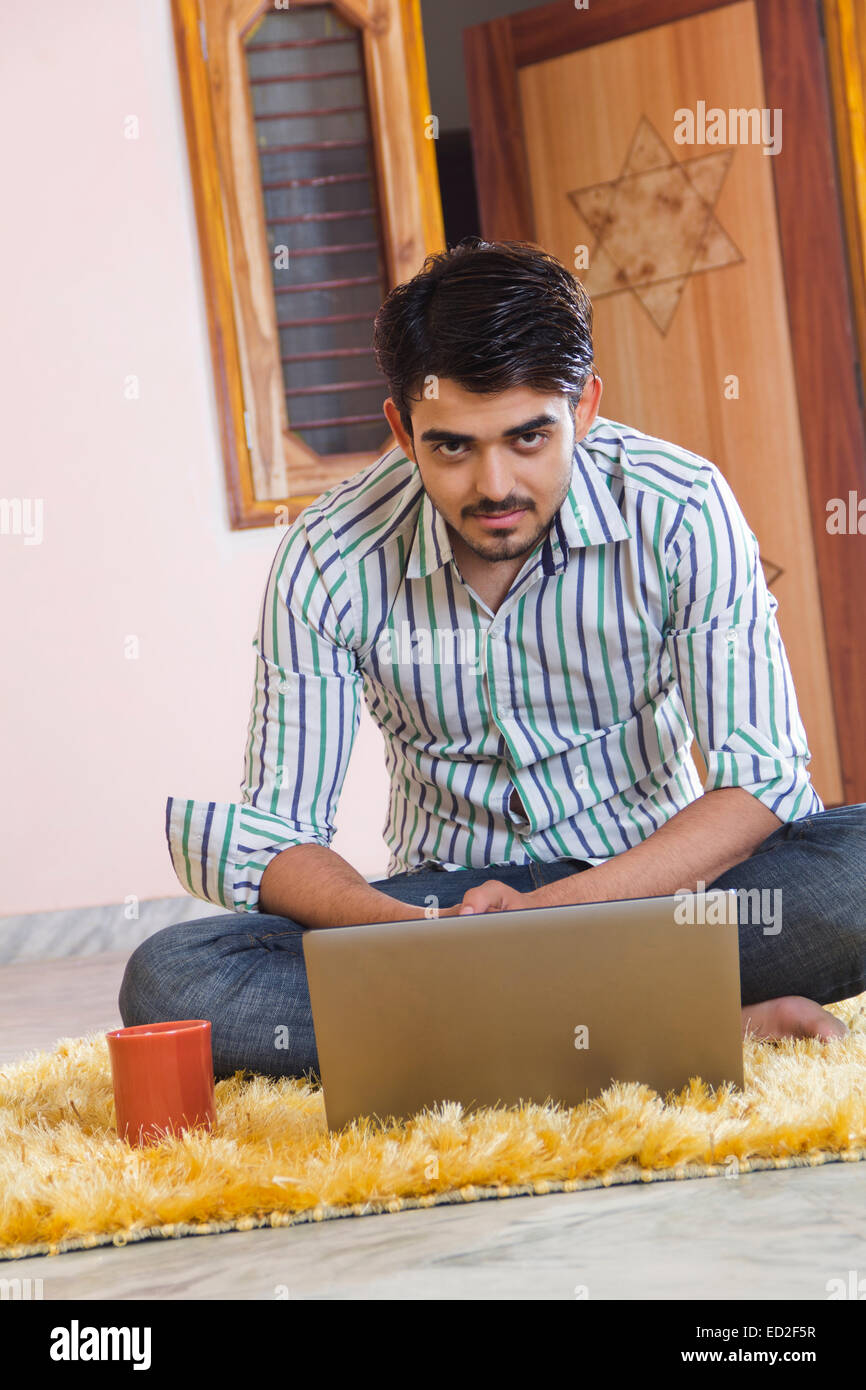 Indian man home sits hi-res stock photography and images - Alamy