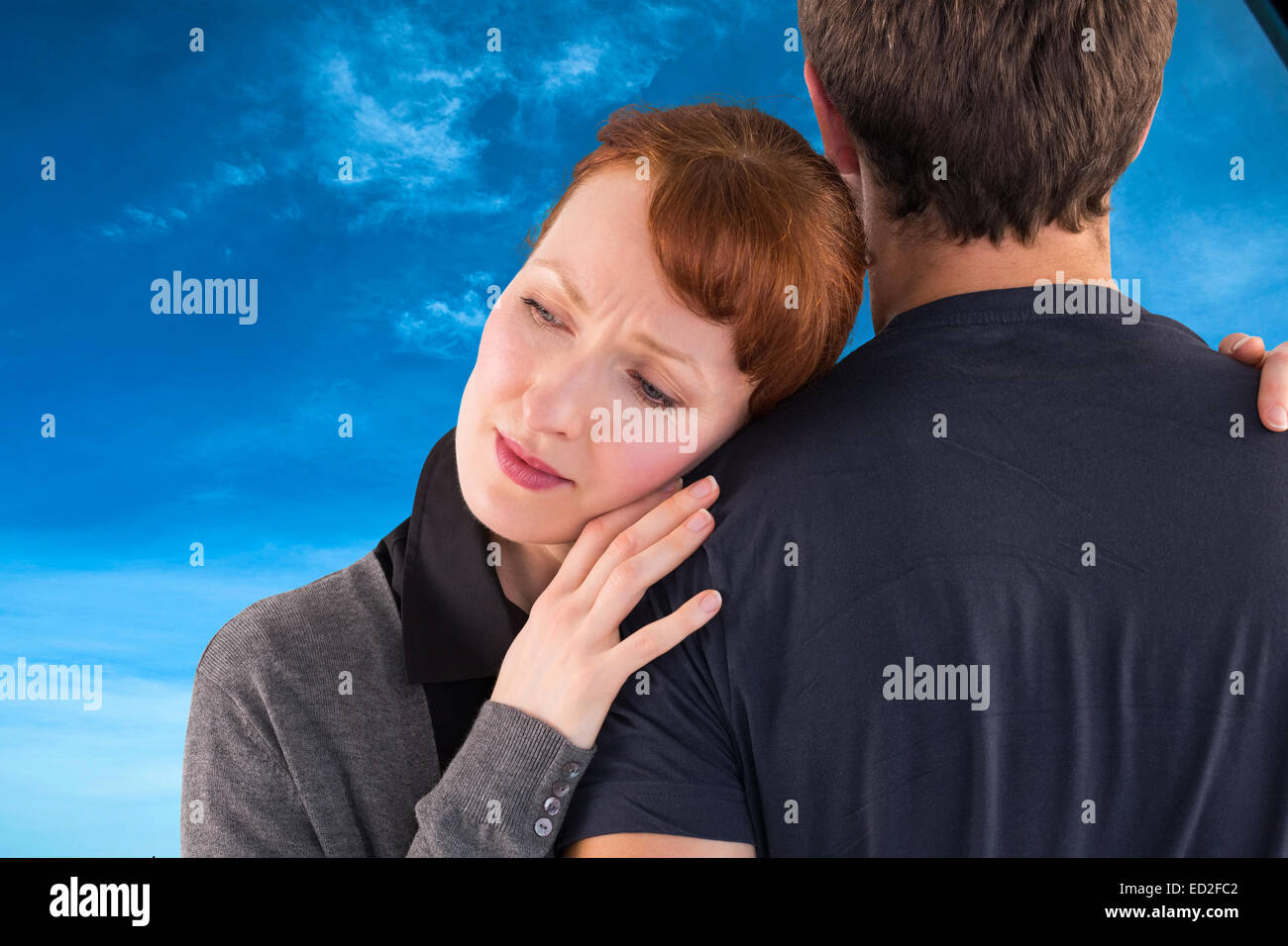 Woman holding onto man hi-res stock photography and images - Alamy