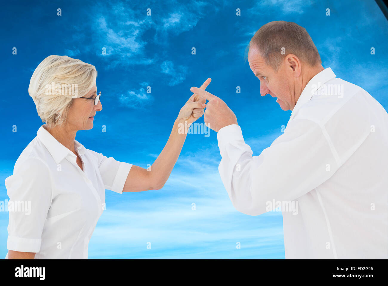 Composite image of angry older couple arguing with each other Stock ...