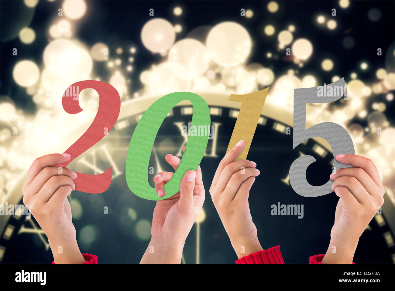 Composite image of hands holding poster Stock Photo - Alamy