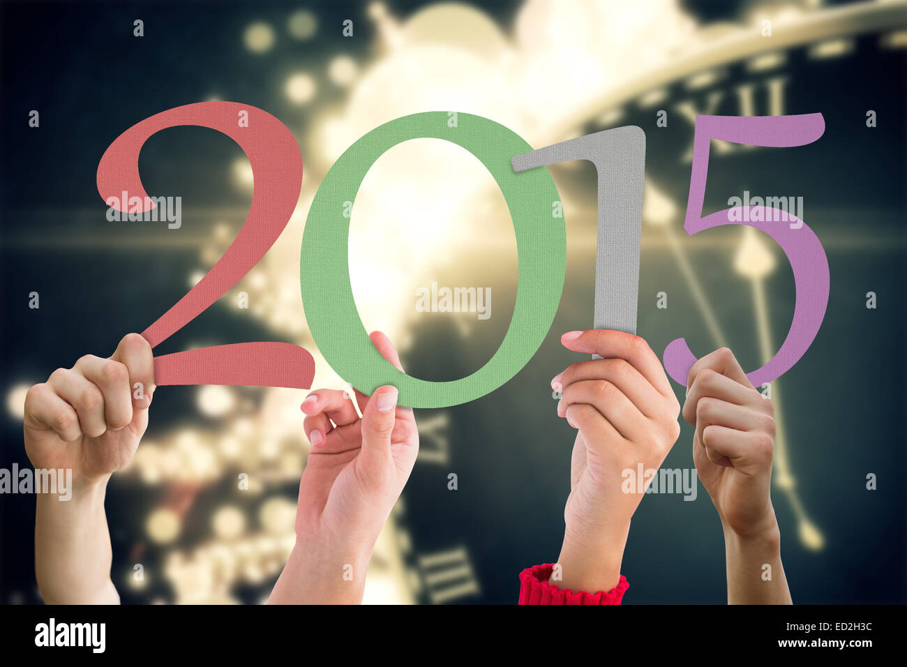 Composite image of hands holding poster Stock Photo - Alamy