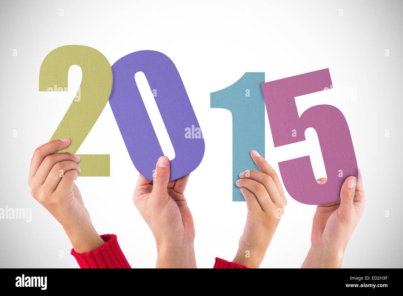 Composite image of hands holding poster Stock Photo - Alamy