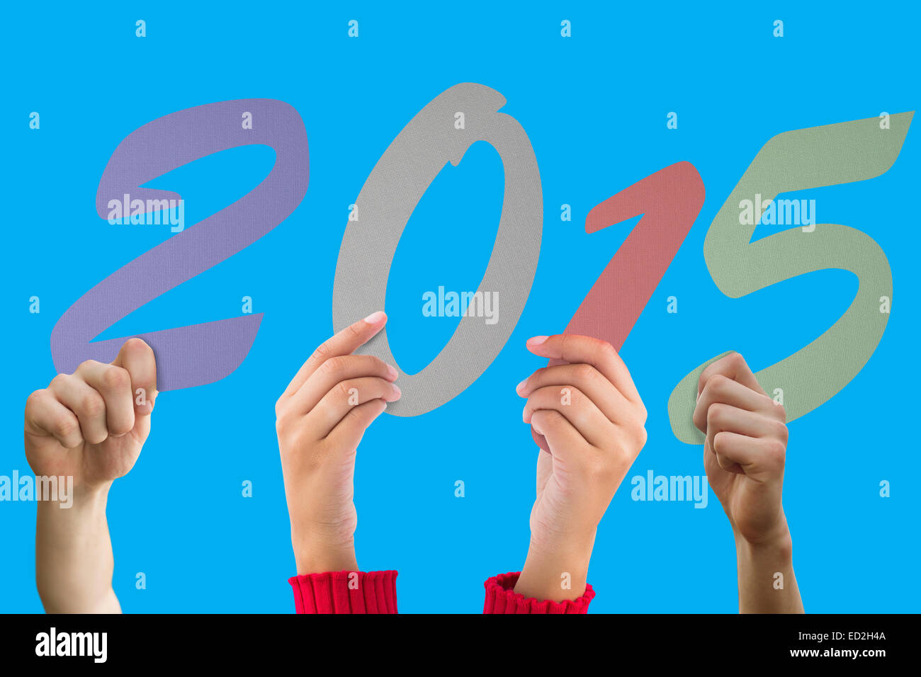 Composite image of hands holding poster Stock Photo - Alamy