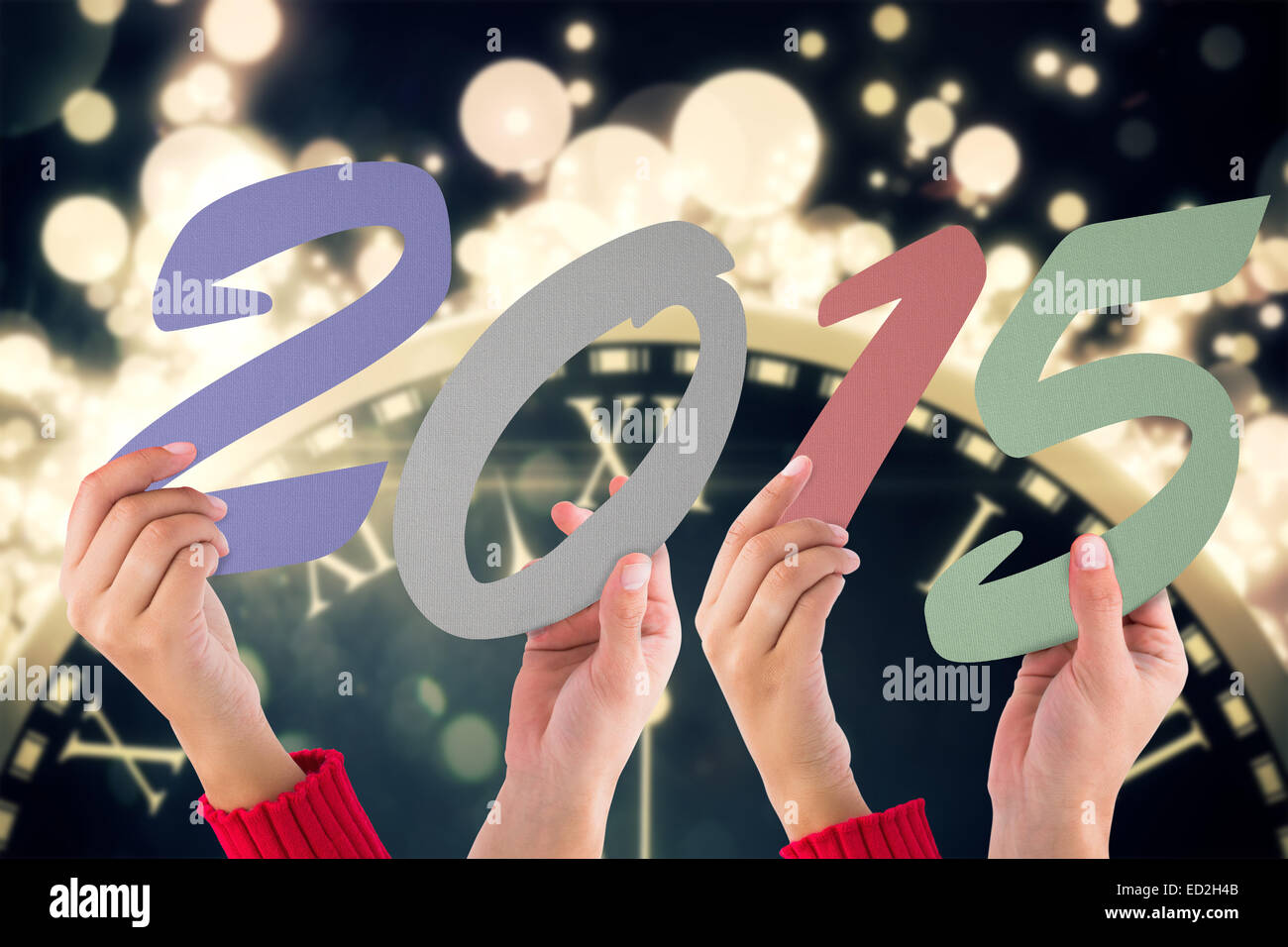 Composite image of hands holding poster Stock Photo - Alamy