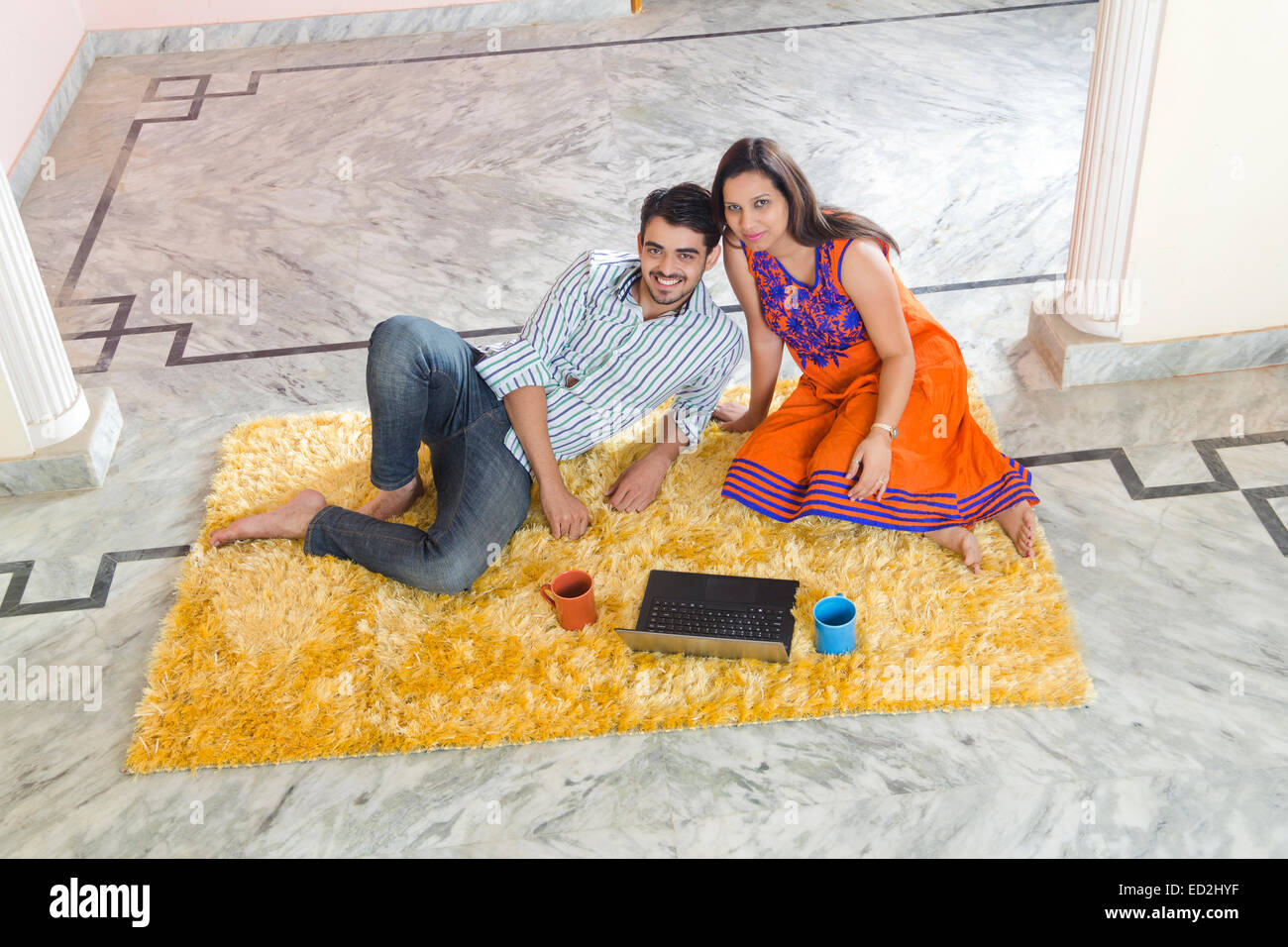 2 indian married couple home laptop working Stock Photo - Alamy