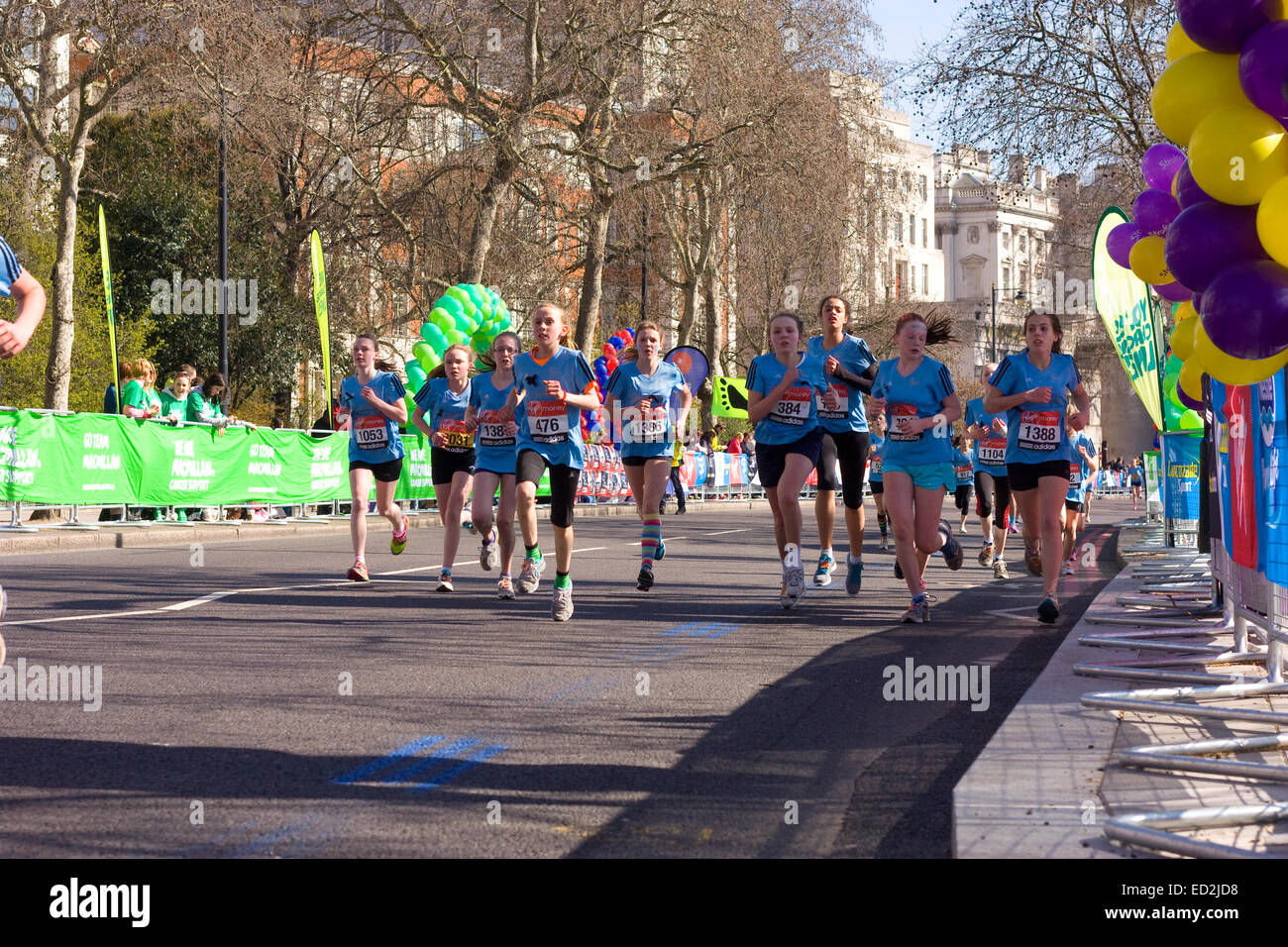LONDON - APRIL 13: Unidentified girls run the London marathon on April ...