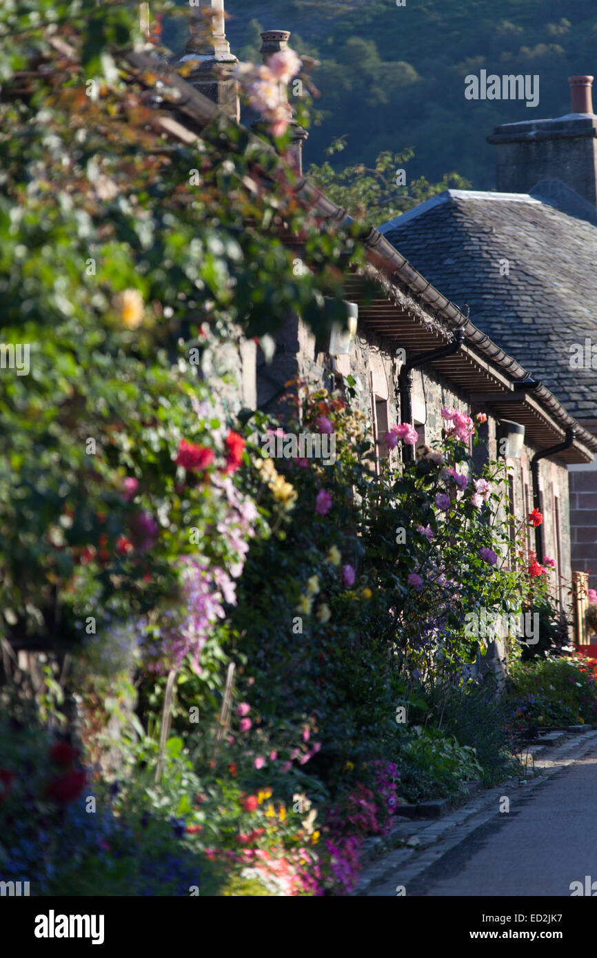 Village of Luss, Scotland. Picturesque summer evening view of cottages ...