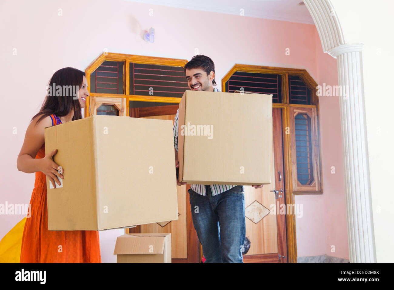 2 indian married couple Home Shifting Stock Photo - Alamy