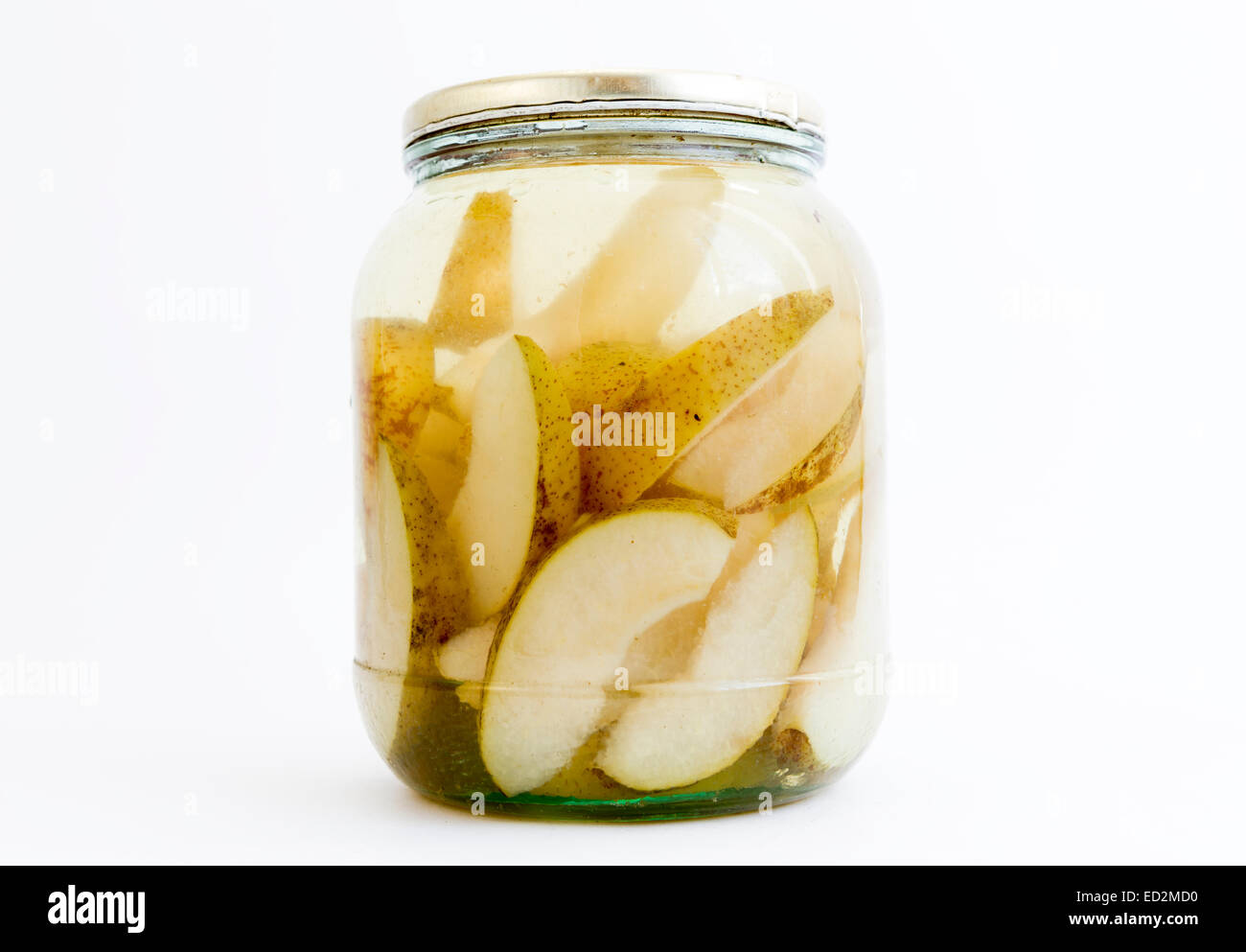 Pears in a jar isolated on white Stock Photo - Alamy