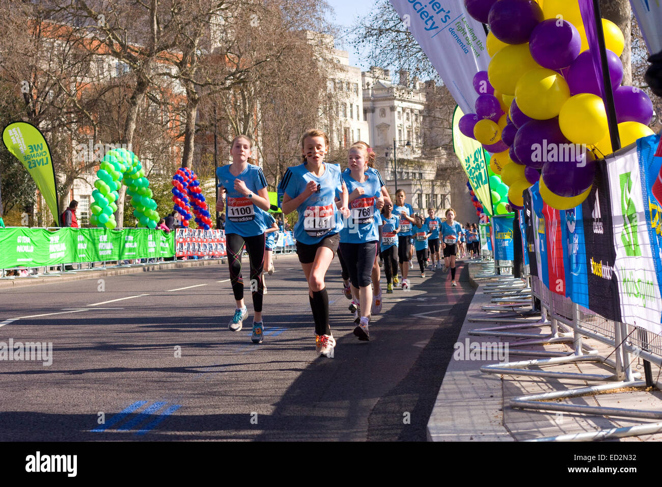 LONDON - APRIL 13: Unidentified girls run the London marathon on April ...