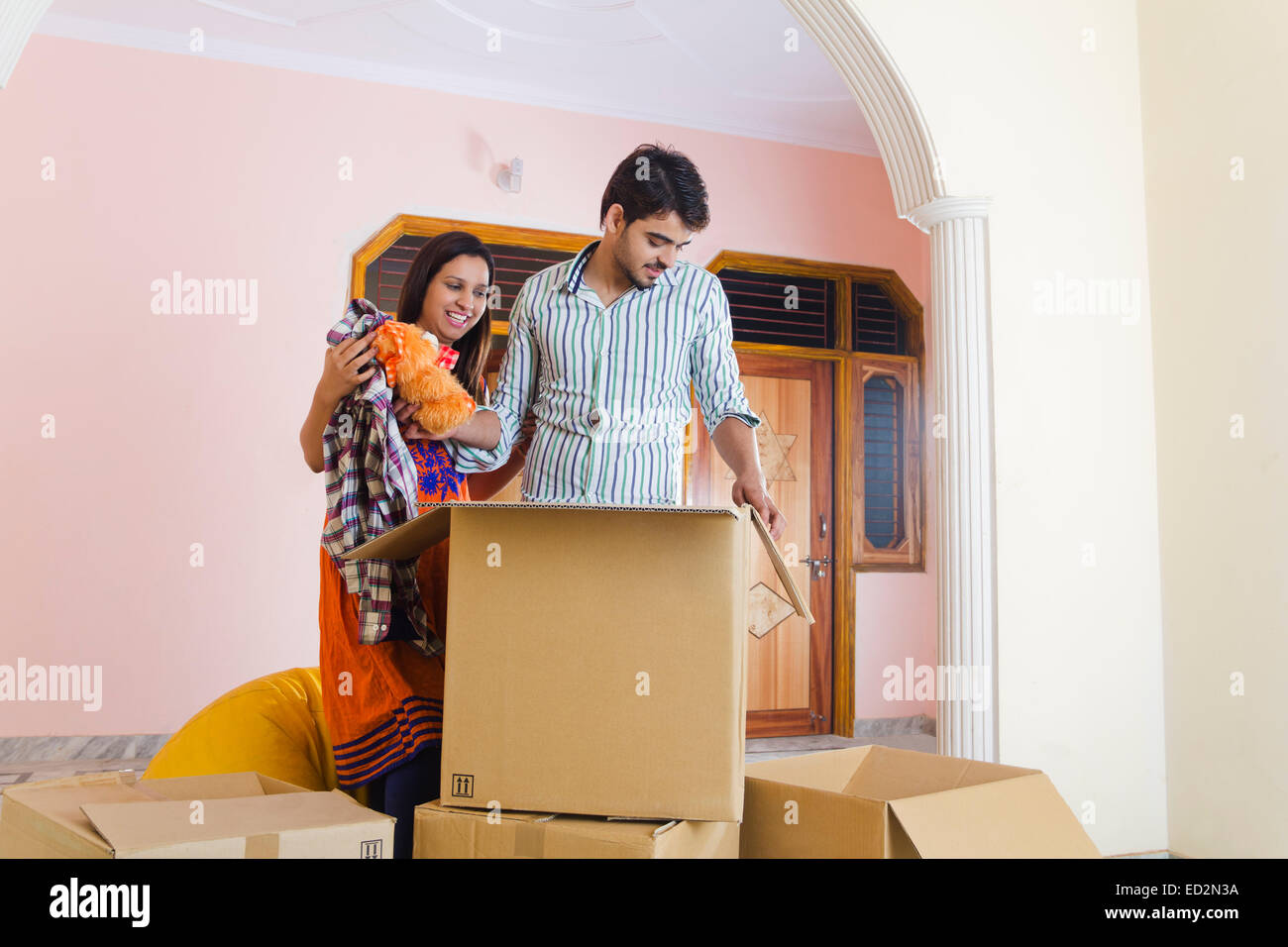 2 indian married couple Home Shifting Stock Photo - Alamy