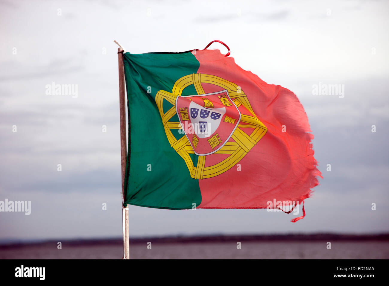 Portuguese flag flying on a boat on Alqueva Lake Stock Photo - Alamy