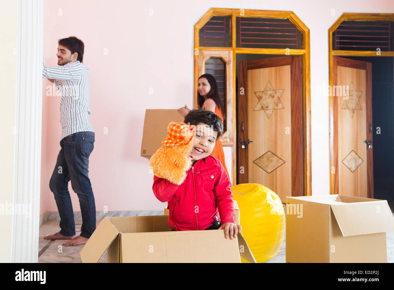 indian Parents and son Home Shifting Stock Photo - Alamy