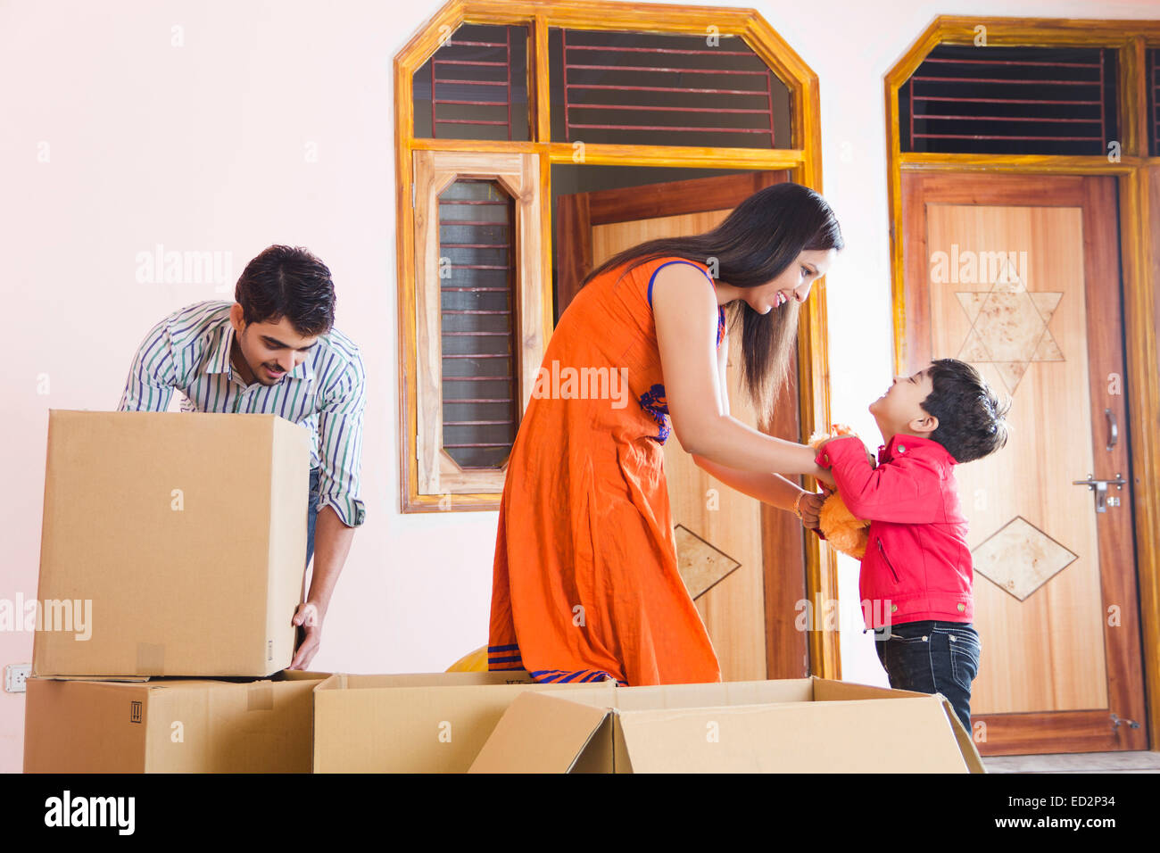 indian Parents and son Home Shifting Stock Photo - Alamy