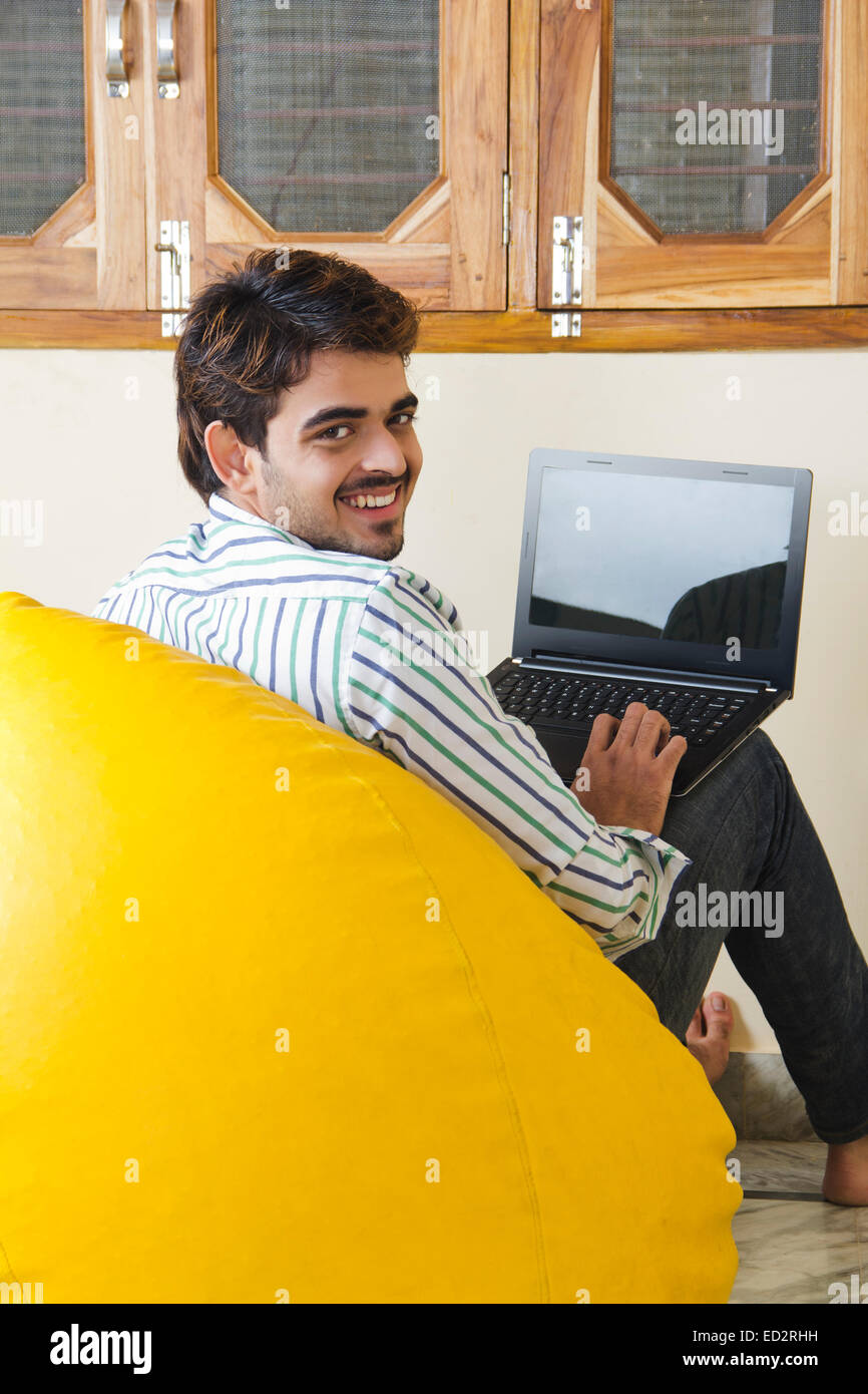 1 indian man home laptop working Stock Photo - Alamy